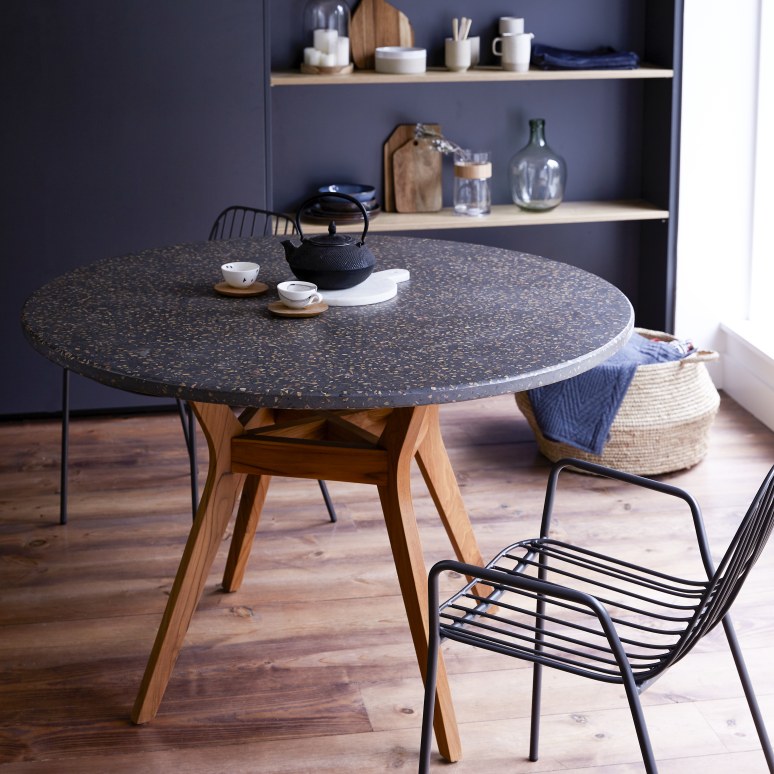 Teak and terrazzo table Sale of round dining tables made from natural materials Tikamoon